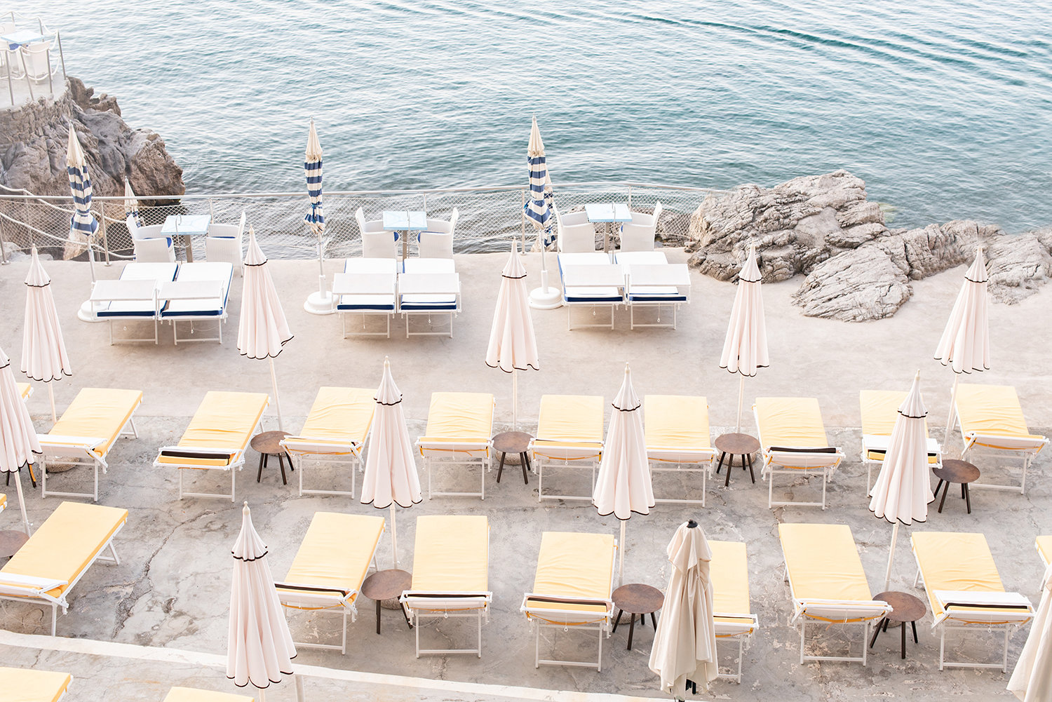 YELLOW LOUNGE CHAIRS - Positano, Italy - Rosemary Tufankjian Photography
